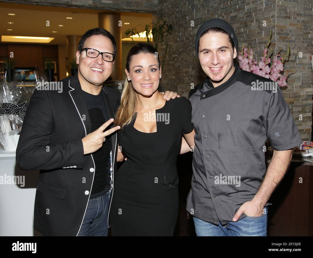 MIAMI - FLORIDA, OCTOBER 8, 2014: Raul Gonzalez, Gloria Ordaz and Chef ...