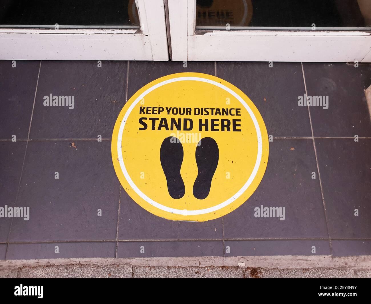 BRAY, IRELAND - Apr 22, 2020: Social distancing sign on the floor with ...