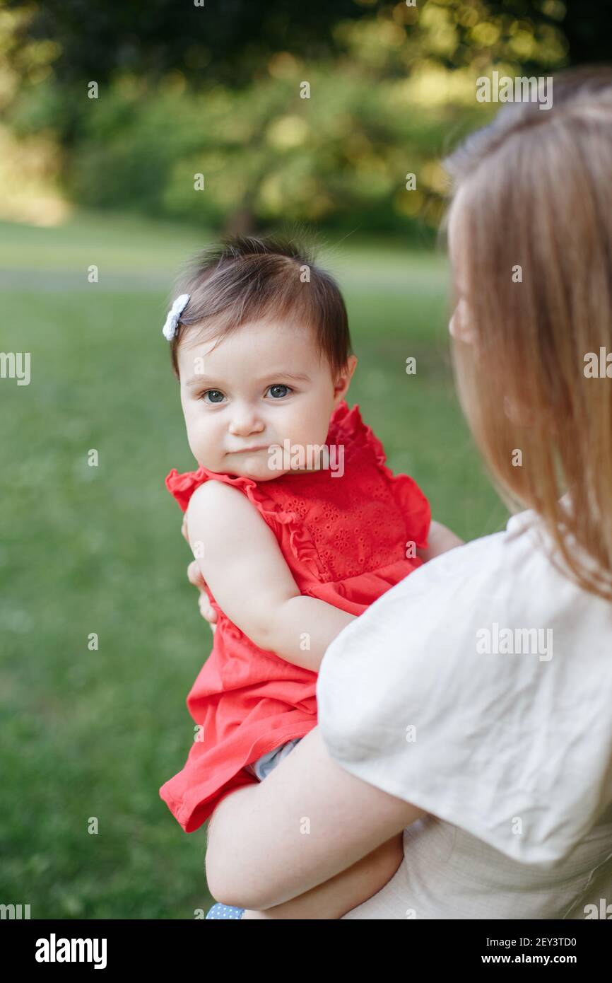 Mothers Day holiday. Young smiling Caucasian mother and girl toddler ...