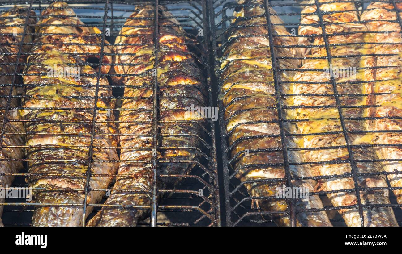 A top view of fresh and delicious mullet fish being roasted on the ...