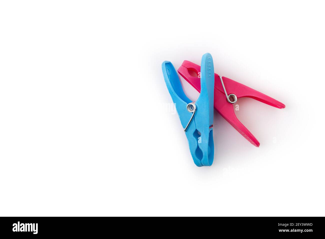 top view of two different color clothespins isolated on white ...