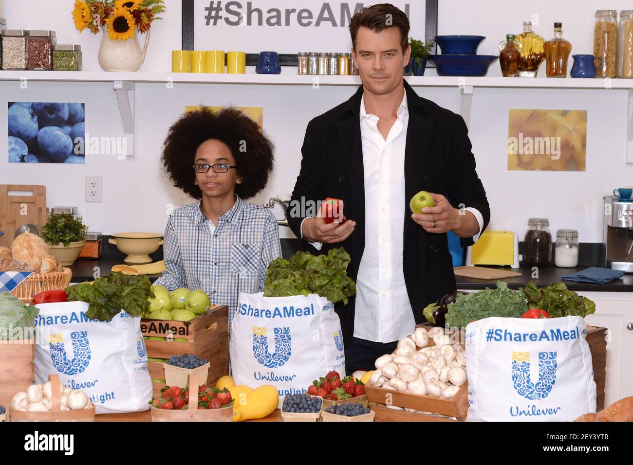 (L-R) Youth Hunger Activist Joshua Williams and Actor Josh Duhamel ...
