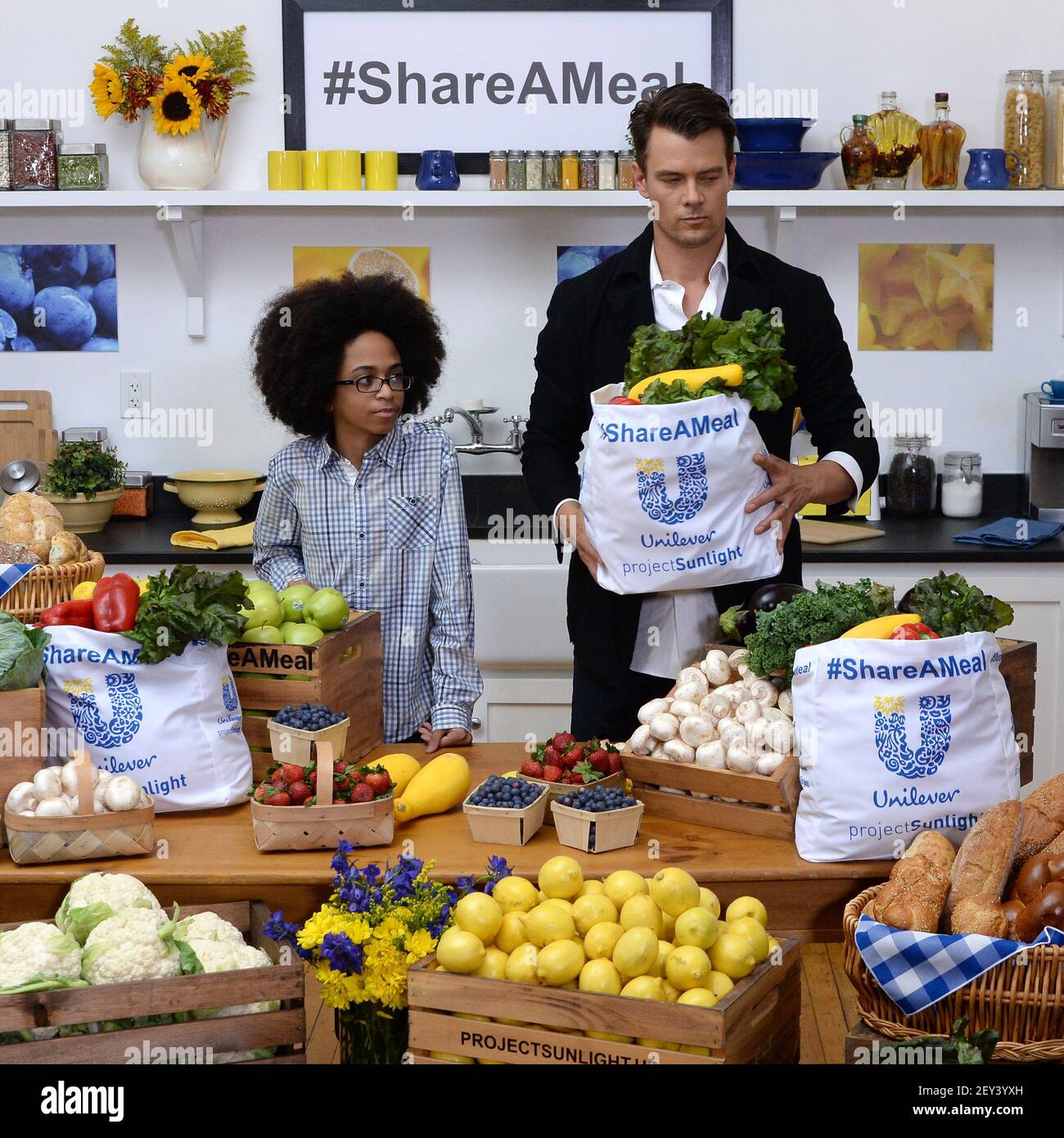 (L-R) Youth Hunger Activist Joshua Williams and Actor Josh Duhamel ...