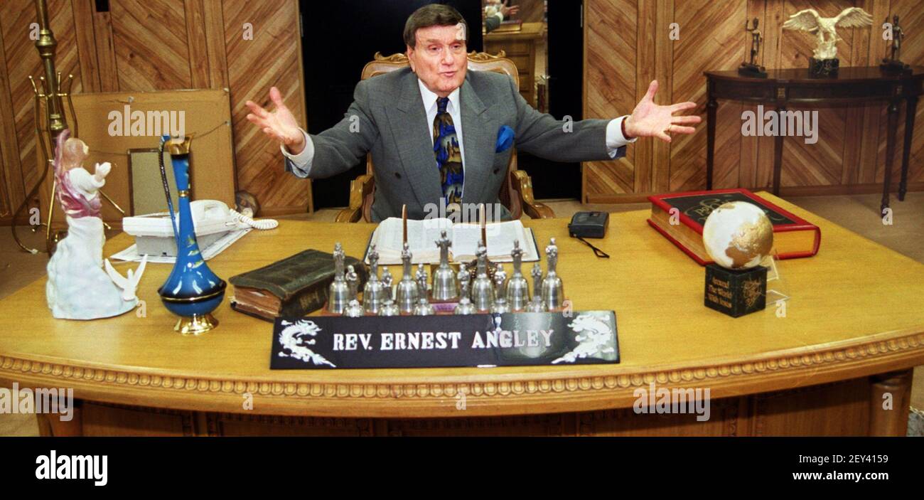 Rev. Ernest Angley talks about his ministry at his desk in his office ...