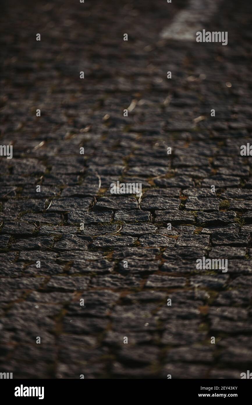 An old dark gray cobblestone pavement texture Stock Photo - Alamy