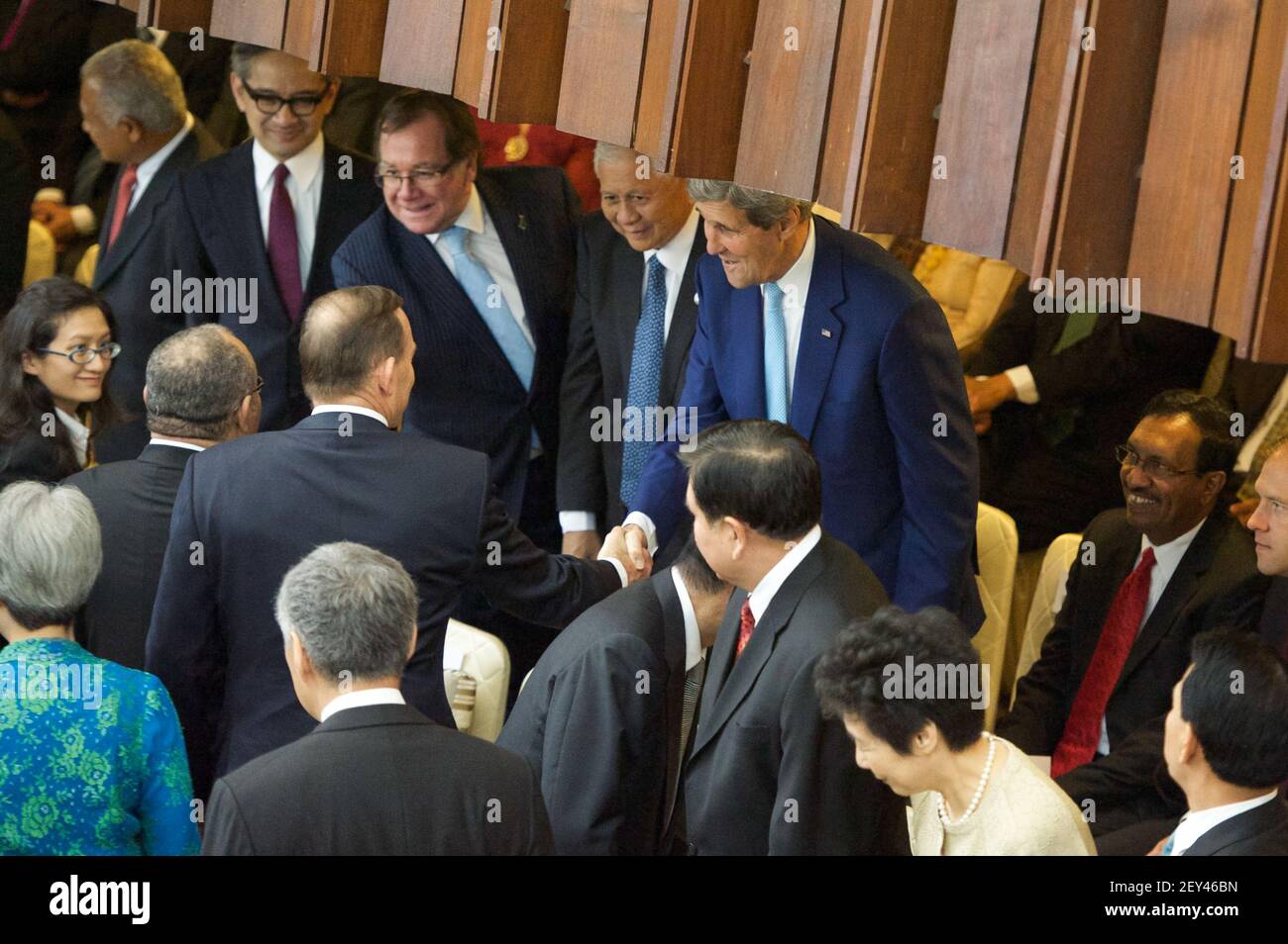 U.S. Secretary of State John Kerry shakes hands with Prime Minister ...