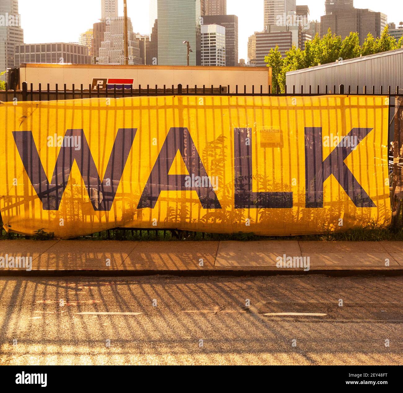 walk banner hanging from fence in Brooklyn New York City Stock Photo ...