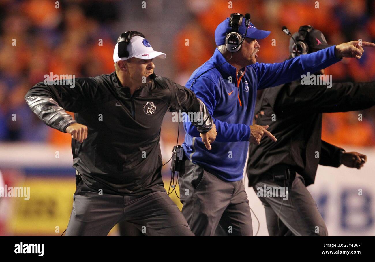 Boise State coaches, including head coach Bryan Harsin, left, celebrate ...