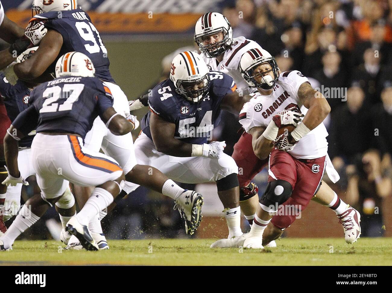 Auburn Tigers defensive lineman Jeffrey Whitaker (54) brings down South ...