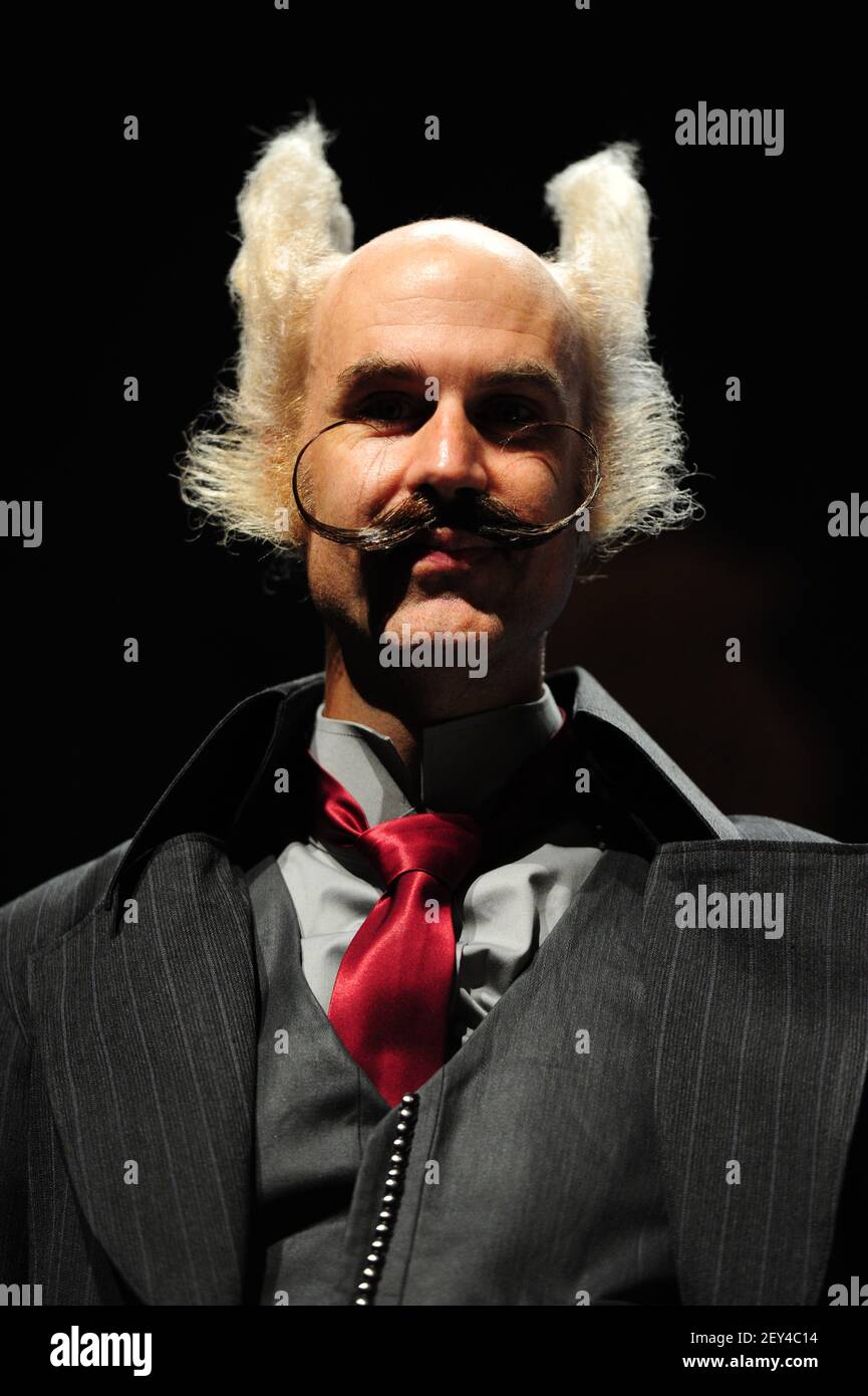 A man shows off his moustache at the Keller Auditorium during the World ...