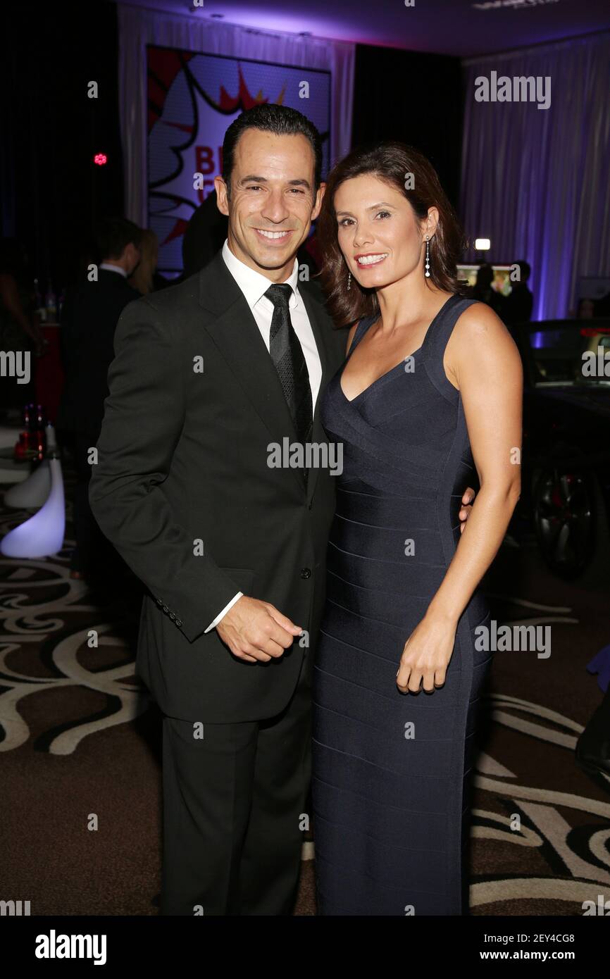 MIAMI BEACH, FL - OCTOBER 25: Helio Castroneves and Adriana Henao ...