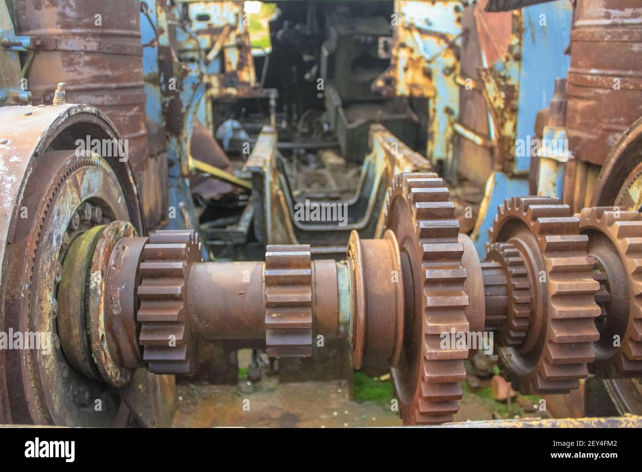 Rusty transmission gears of a Soviet wrecked tank close-up Stock Photo ...