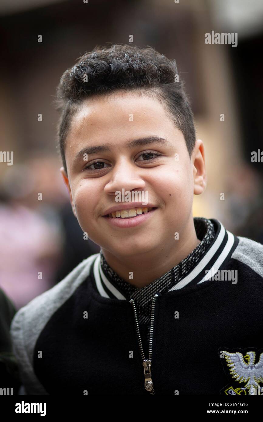 Portrait of a young Egyptian boy smiling in the Islamic quarter of ...
