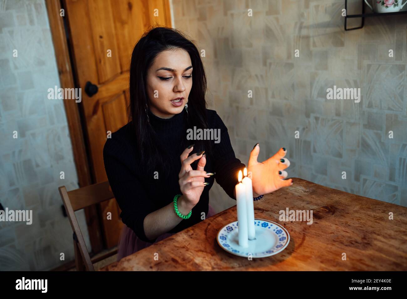 fortune teller shuffles cards to predict the future Stock Photo - Alamy