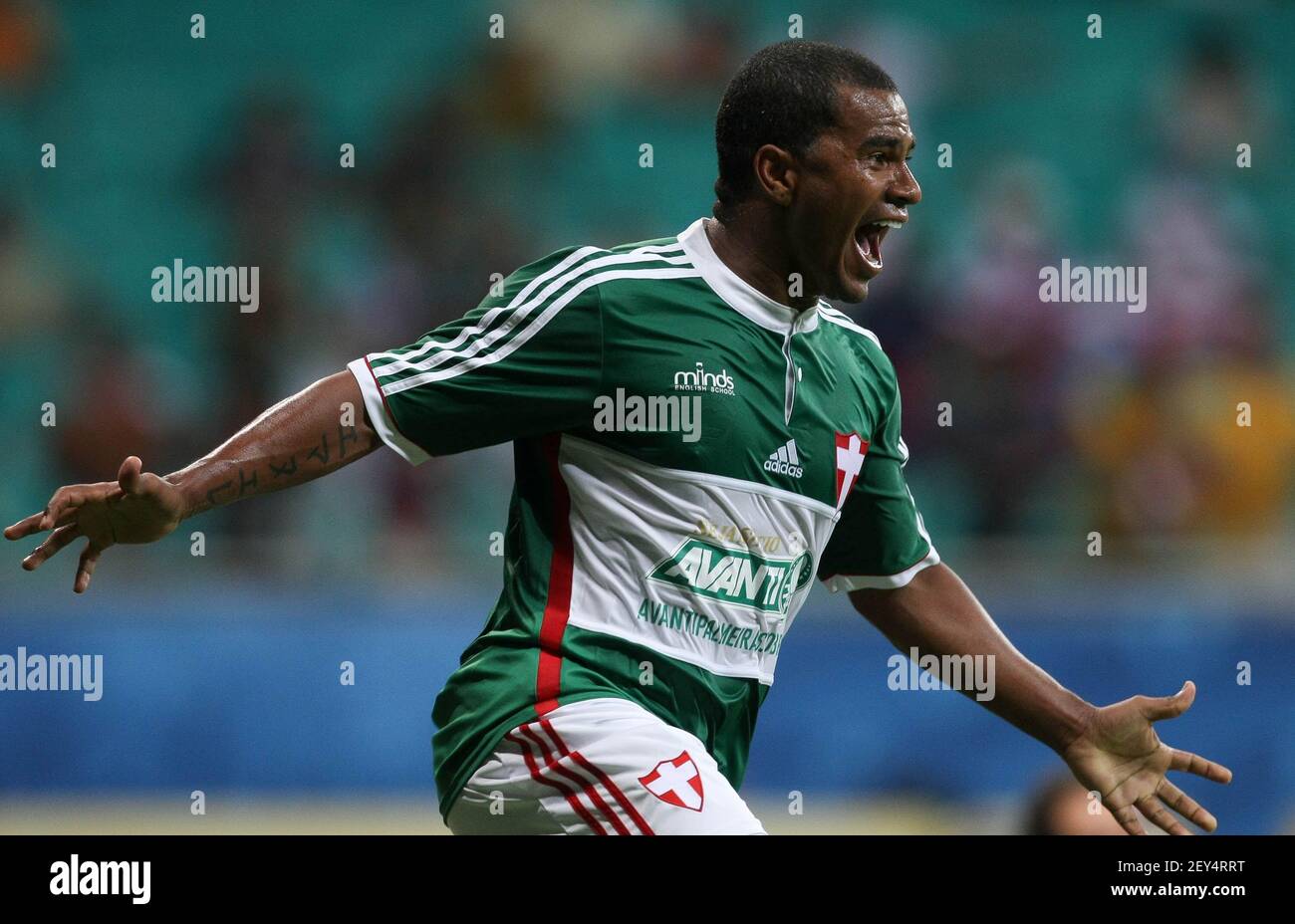 Mazinho celebrates after scoring a goal during the soccer match between ...
