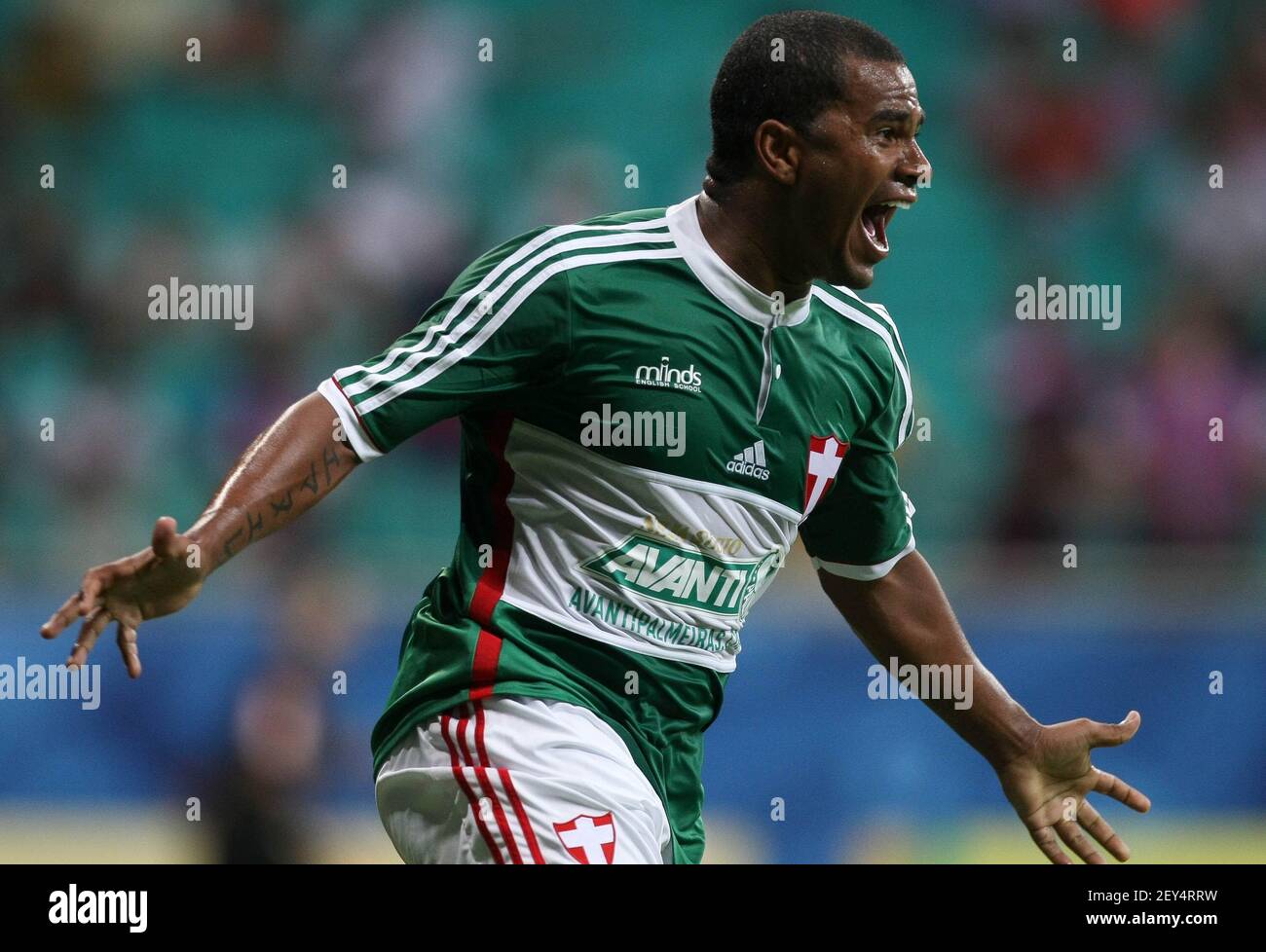 Mazinho celebrates after scoring a goal during the soccer match between ...