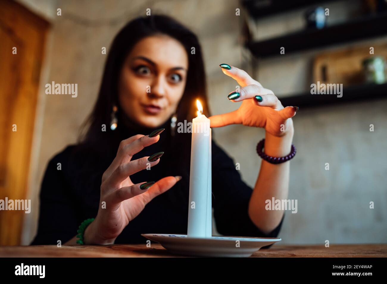 fortune teller shuffles cards to predict the future Stock Photo - Alamy