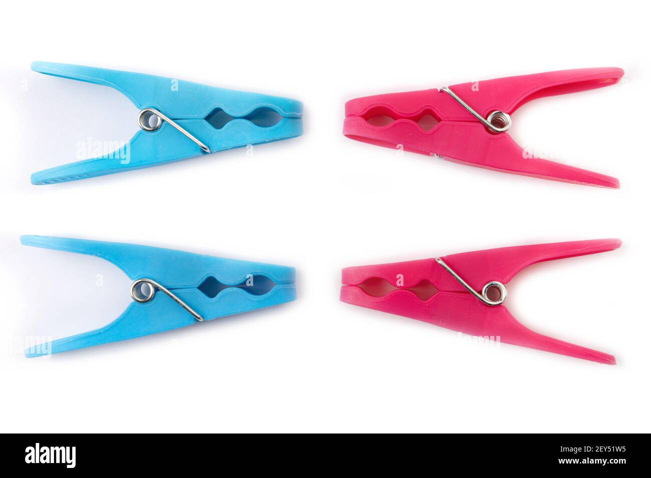 top view of four different color clothespins isolated on white ...