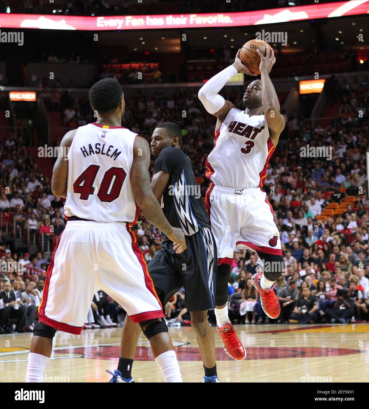 The Miami Heat's Dwyane Wade (3) is fouled by the Minnesota ...