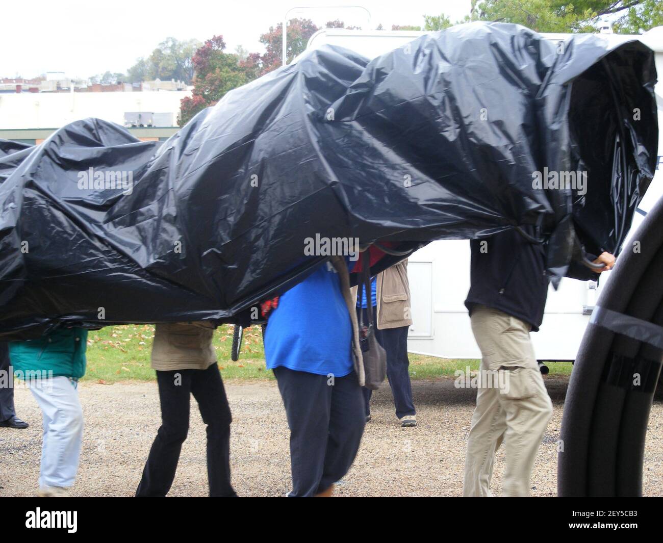 Protestors wearing a pipeline costume march at an anti-Atlantic Coast ...