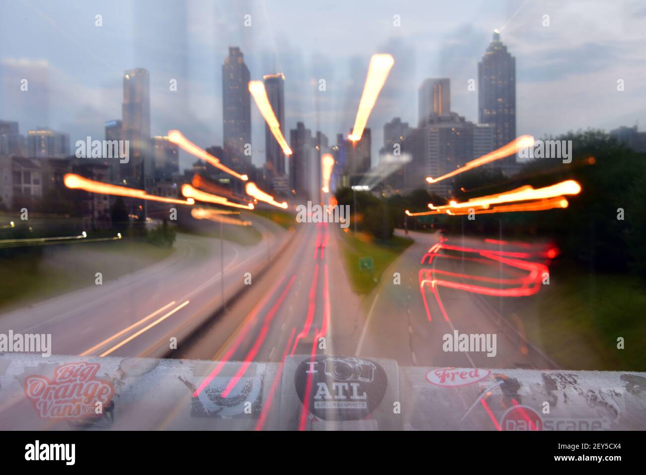 Zoom blur of downtown Atlanta from an overpass at dawn Stock Photo - Alamy