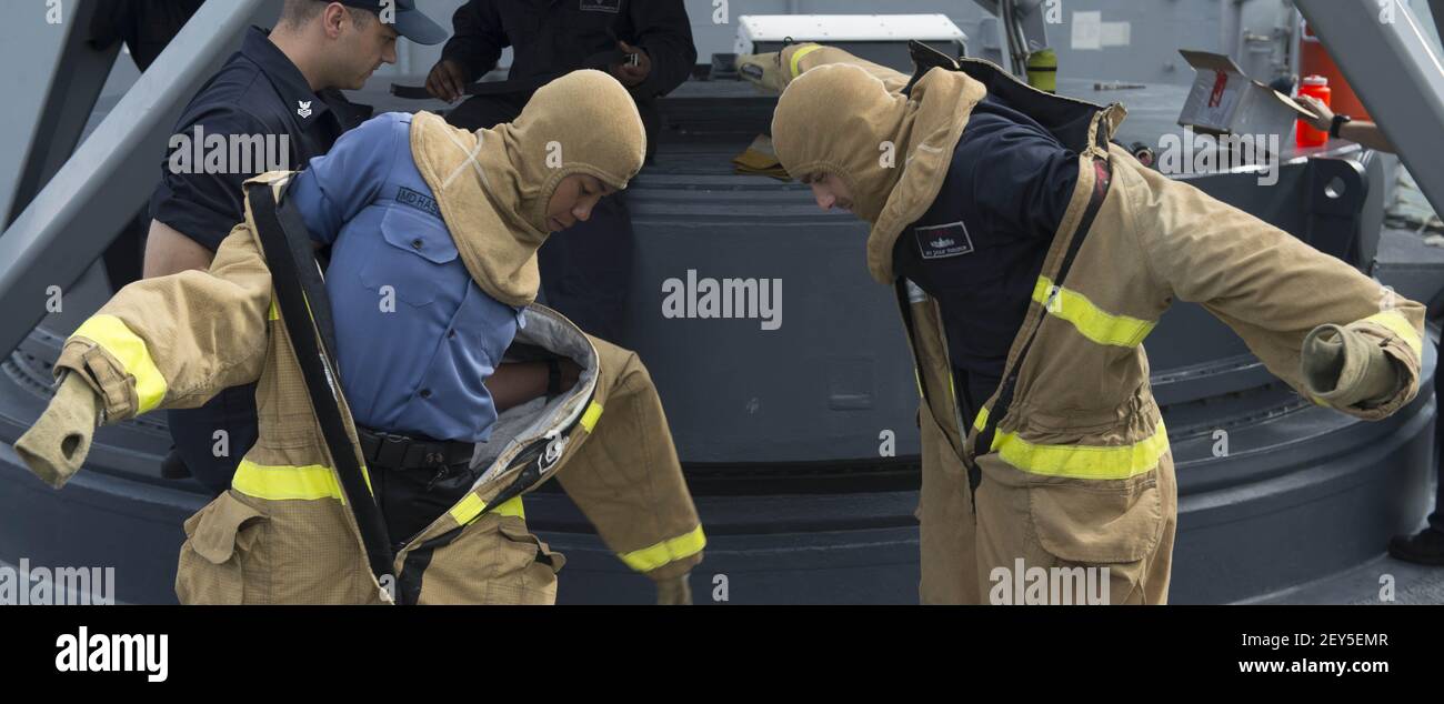 MUARA NAVAL BASE, Brunei (Nov. 11, 2014) Damage Controlman 1st Class ...