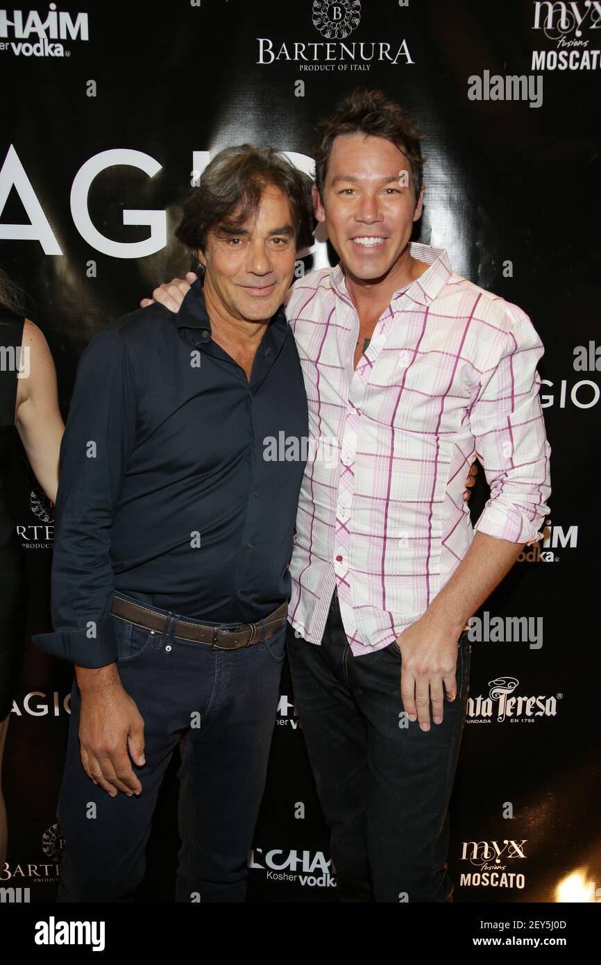 Designers Roberto Garbugli and David Bromstad attend the grand opening ...
