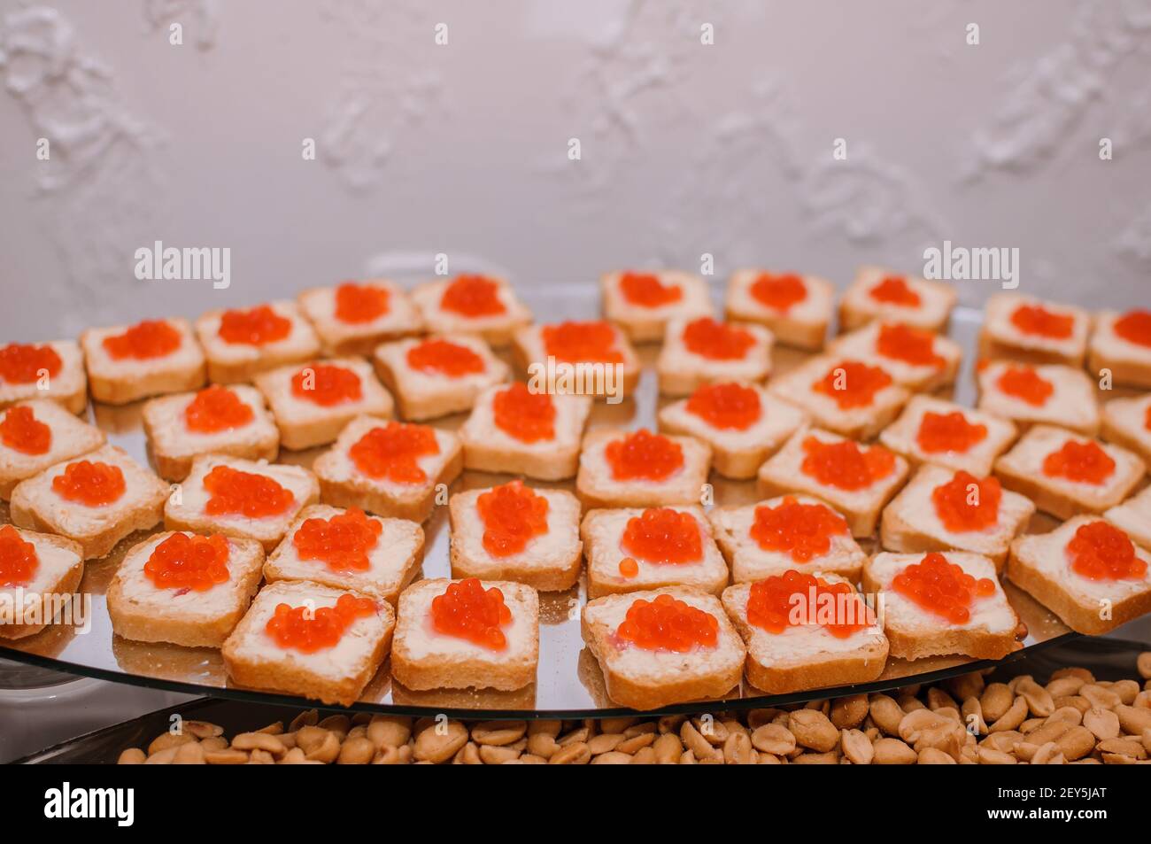 Canape with red caviar. Wedding buffet Stock Photo - Alamy