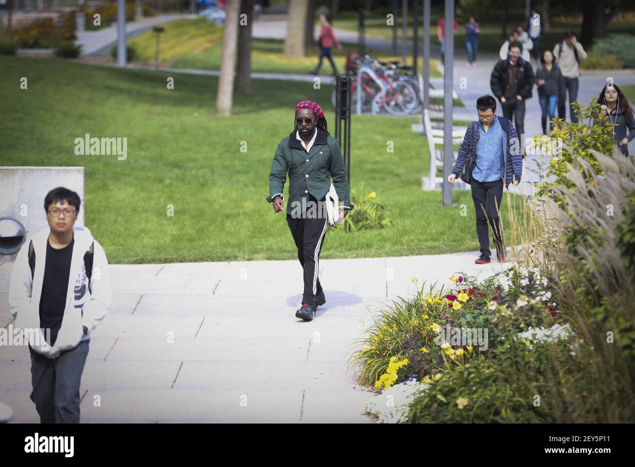 Author Marlon James walks to a class he teaches on the Macalester ...