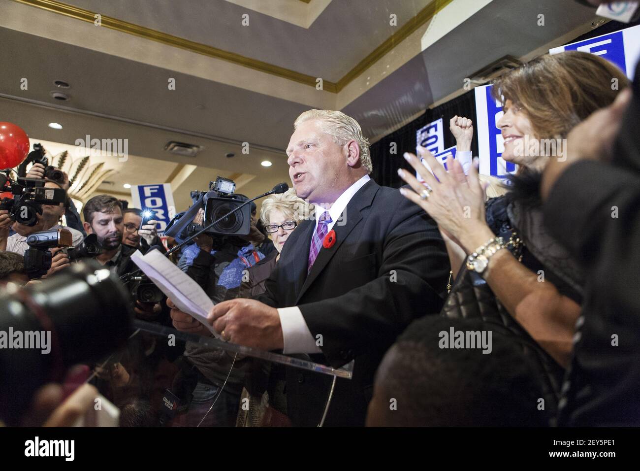 Flanked by his mother Ruth Diane Ford (left) and wife Karla Ford (right ...