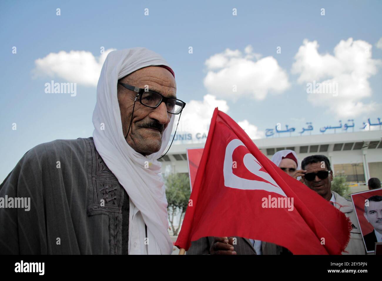 Supporters of Hachmi Hamdi, the leader of "Tayar Mahaba" party, wait ...