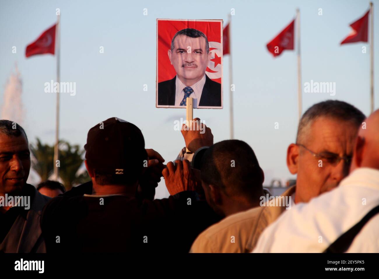 Supporters of Hachmi Hamdi, the leader of "Tayar Mahaba" party, wait ...