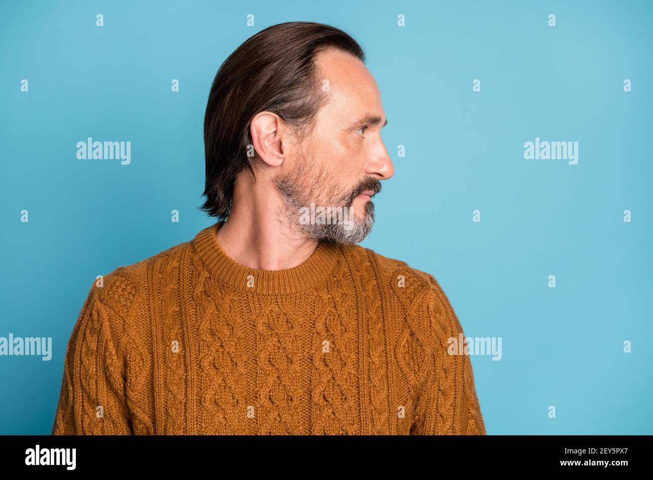 Side profile photo portrait of middle-aged bearded man looking blank ...