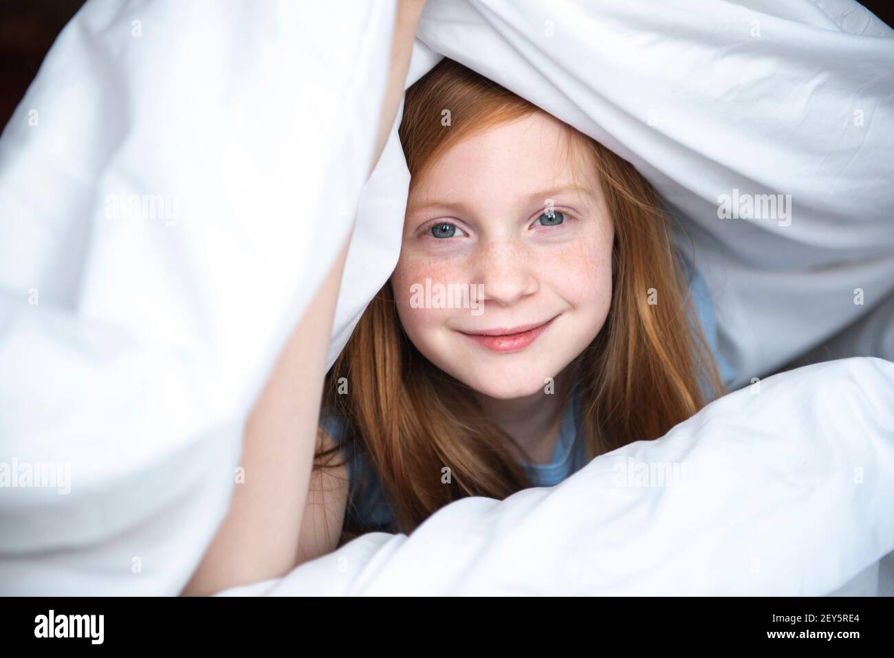 Peeking out from under the bed hi-res stock photography and images - Alamy