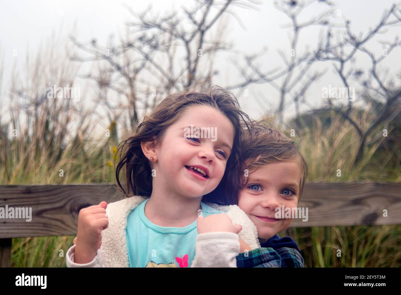 TWIN TODDLERS GOOFING AROUND TOGETHER Stock Photo - Alamy