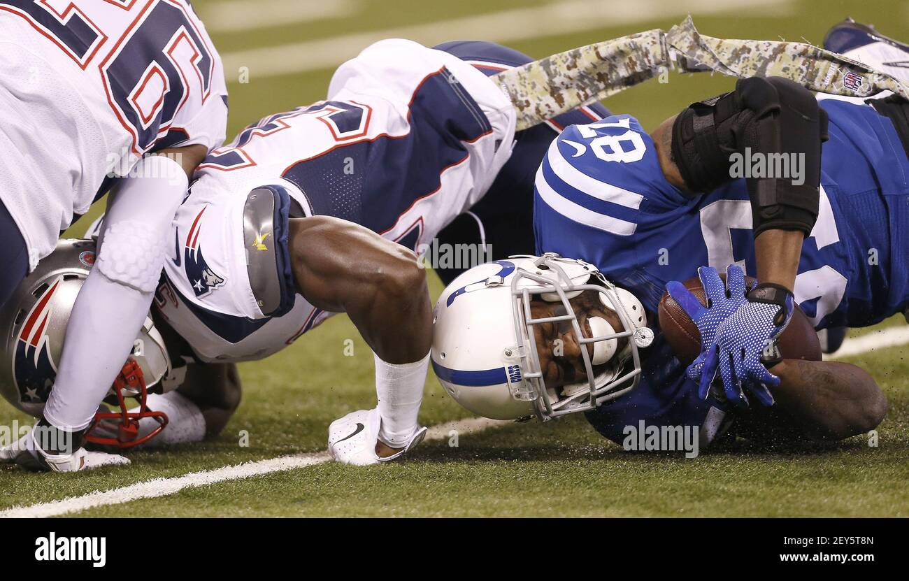 Indianapolis Colts wide receiver Reggie Wayne (87) is taken down by ...