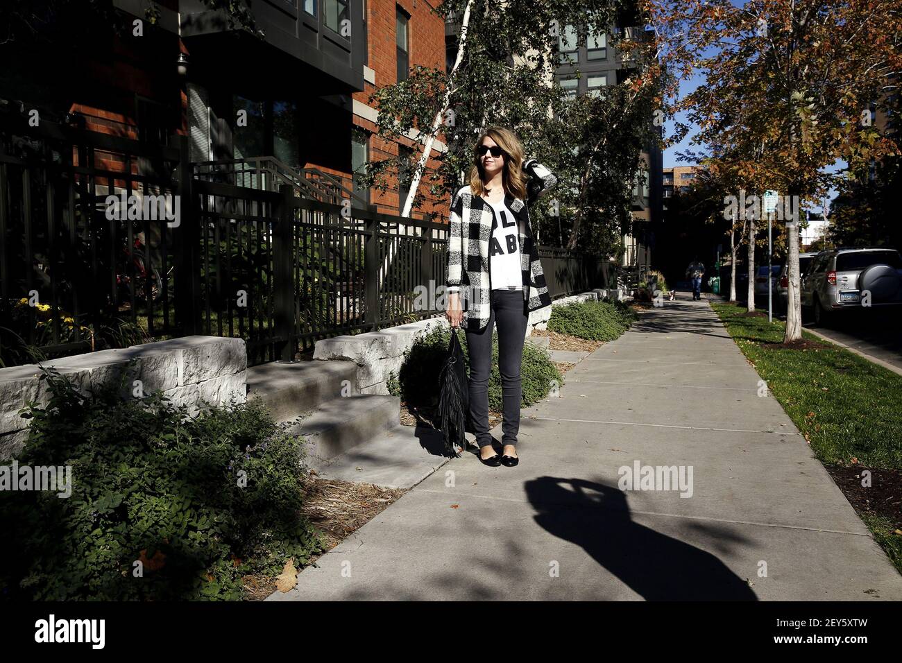 Local fashion blogger Chelsea Lankford is photographed for her blog ...