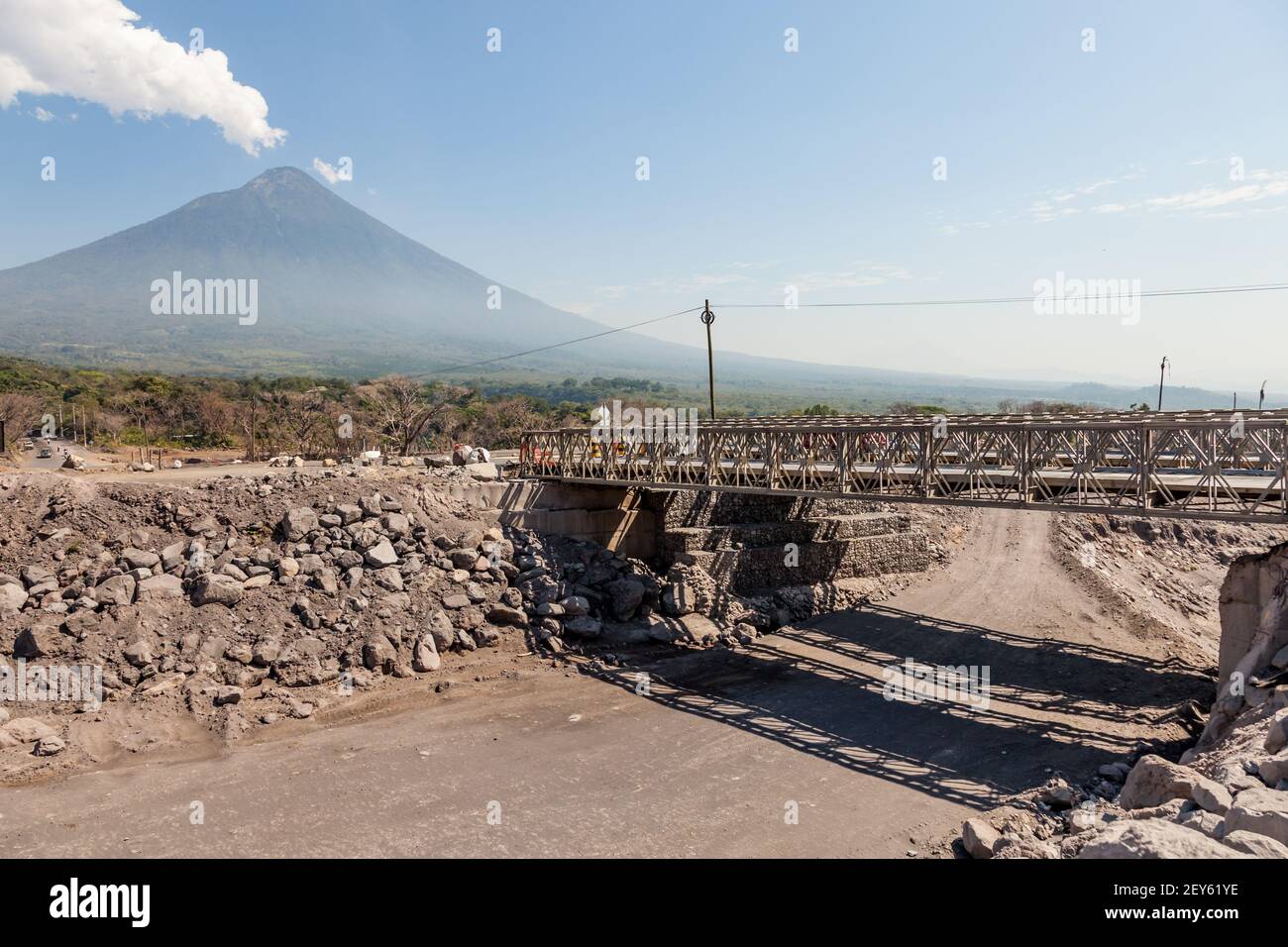 The Agua (Water) volcano viewed from a temporary road bridge ...