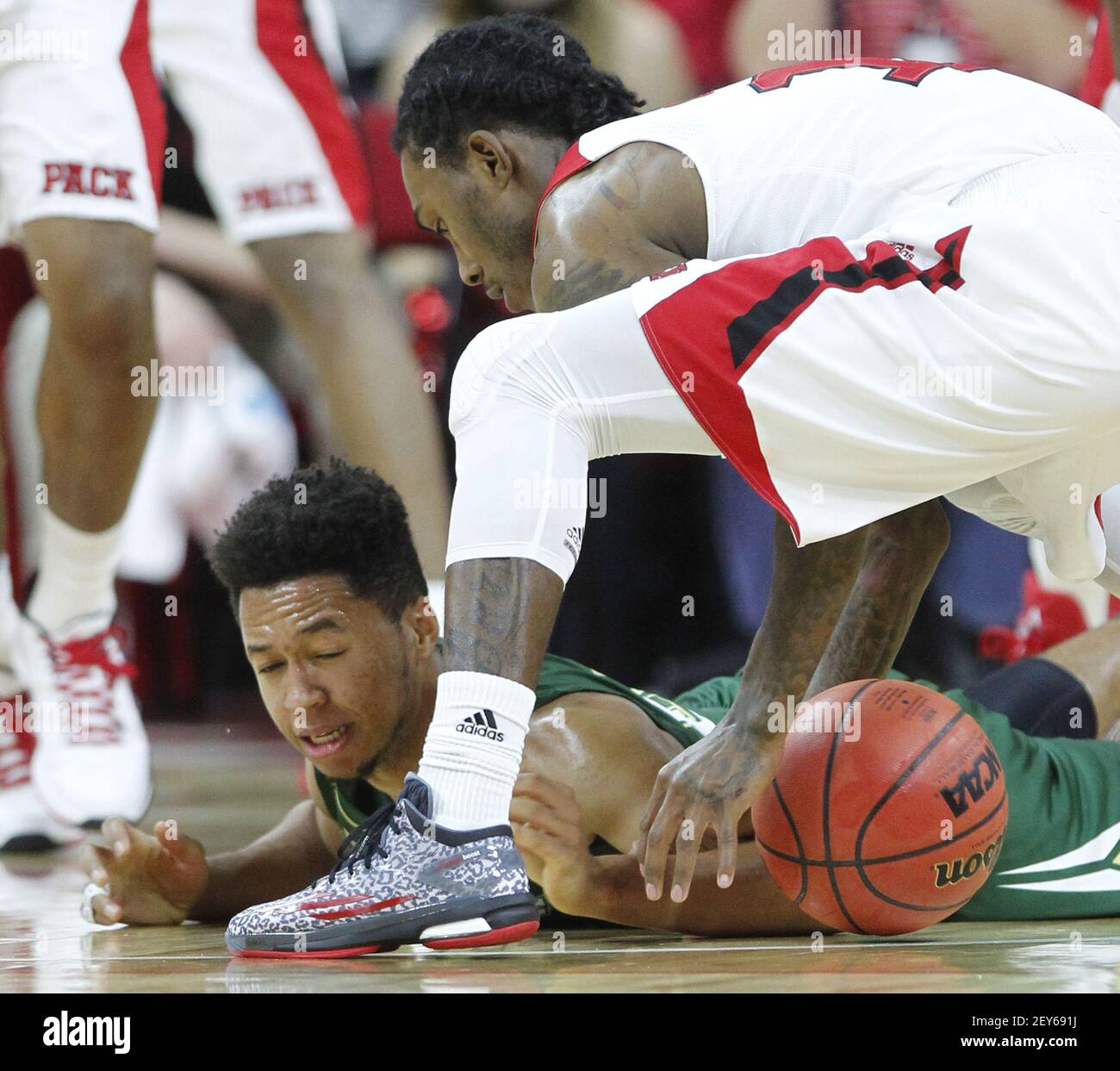 N.C. State's Cat Barber (12) steals the ball from South Florida's Troy ...