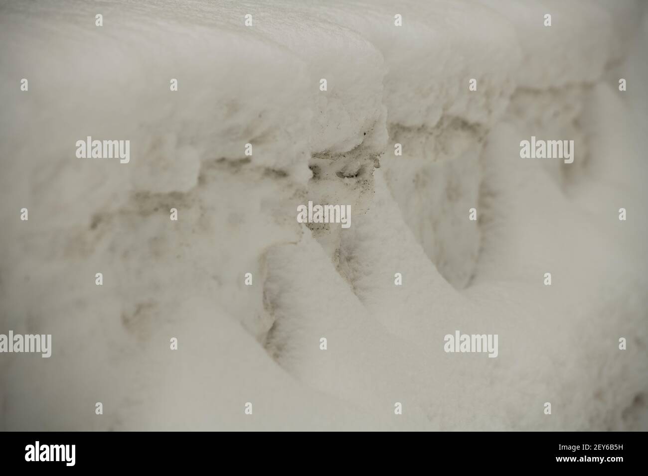 snow scape or winter landscape close up of snow drift ploughed mounds ...
