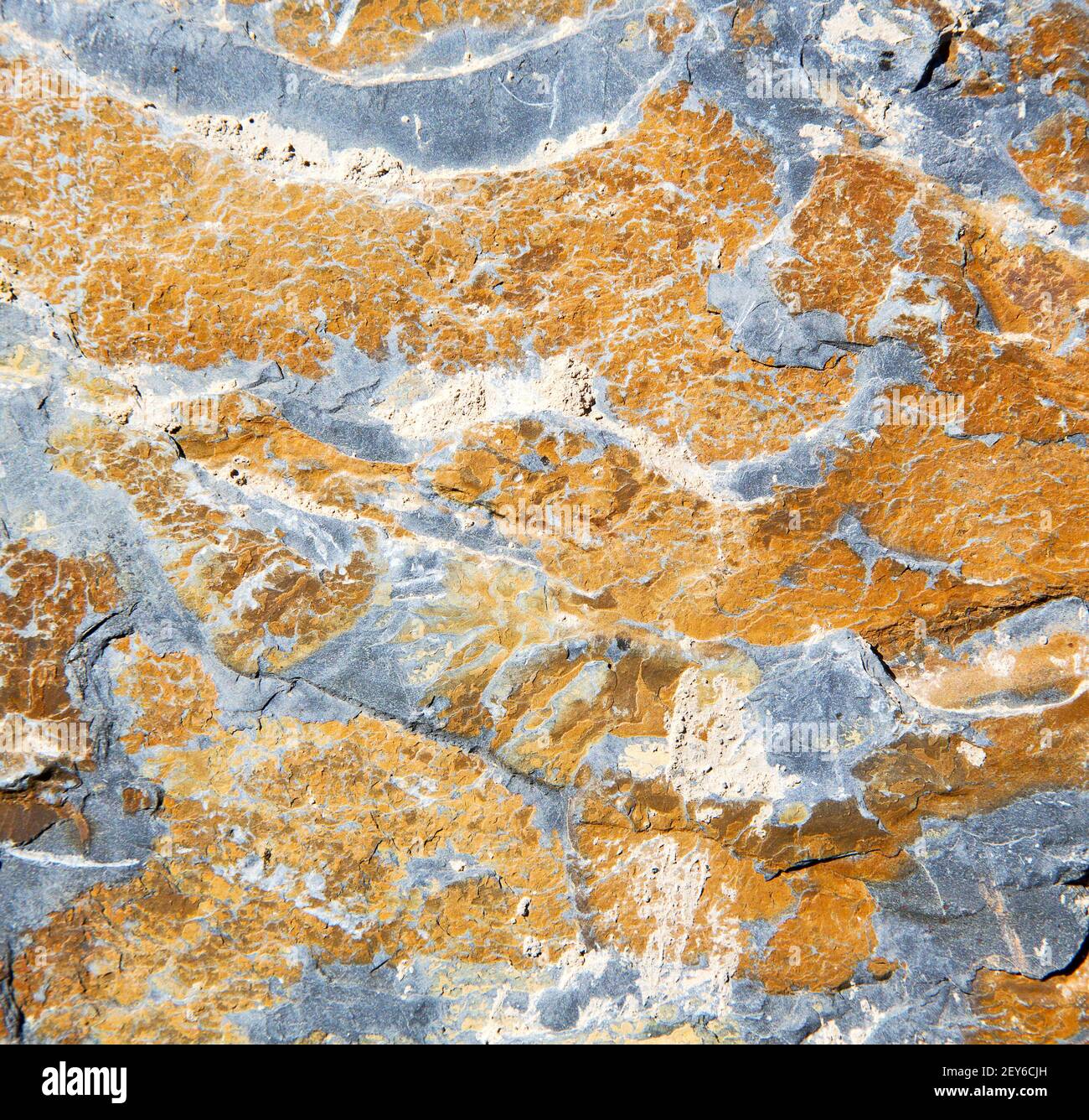 Rocks stone and red orange gneiss in the wall of morocco Stock Photo ...