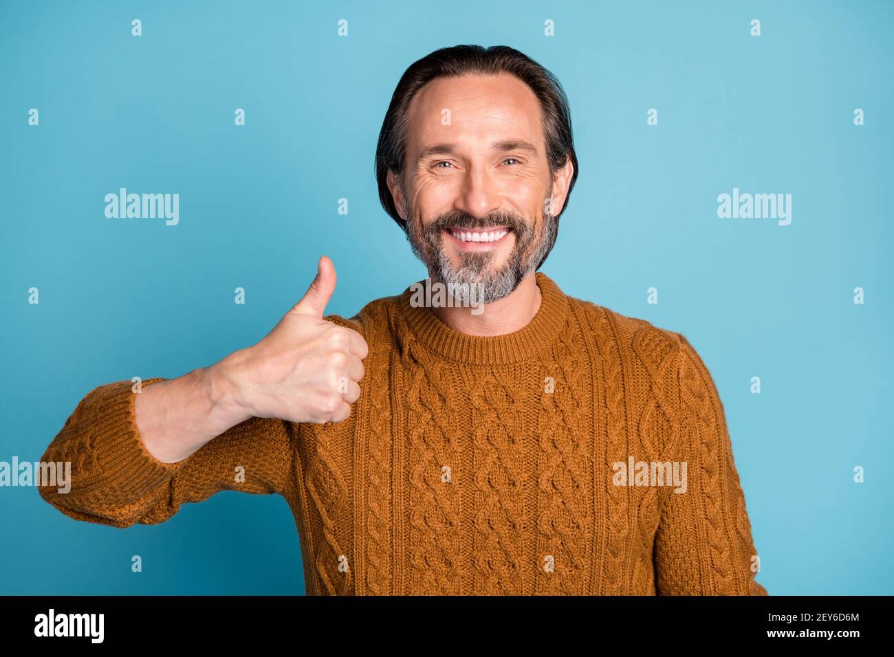 Photo portrait of happy cheerful man showing like sign smiling isolated ...