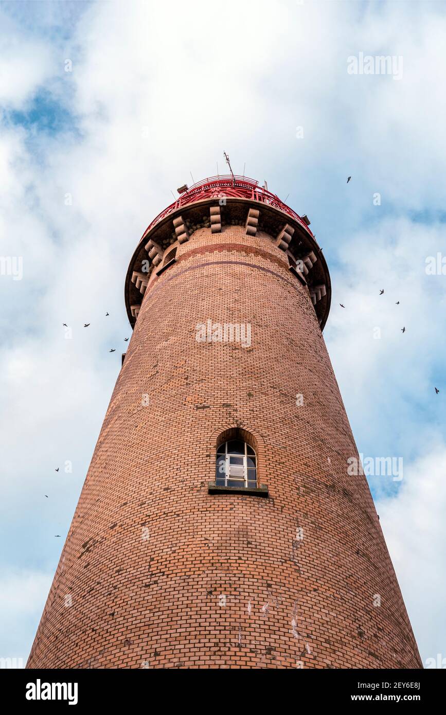 Bottom-up view with an old lighthouse on the island Rugen. Cape Arkona ...