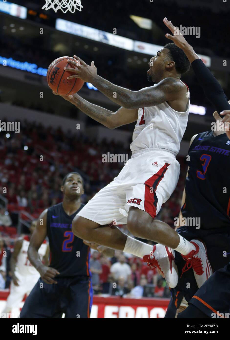 North Carolina State's Trevor Lacey (1) puts in two with 1:05 left in ...