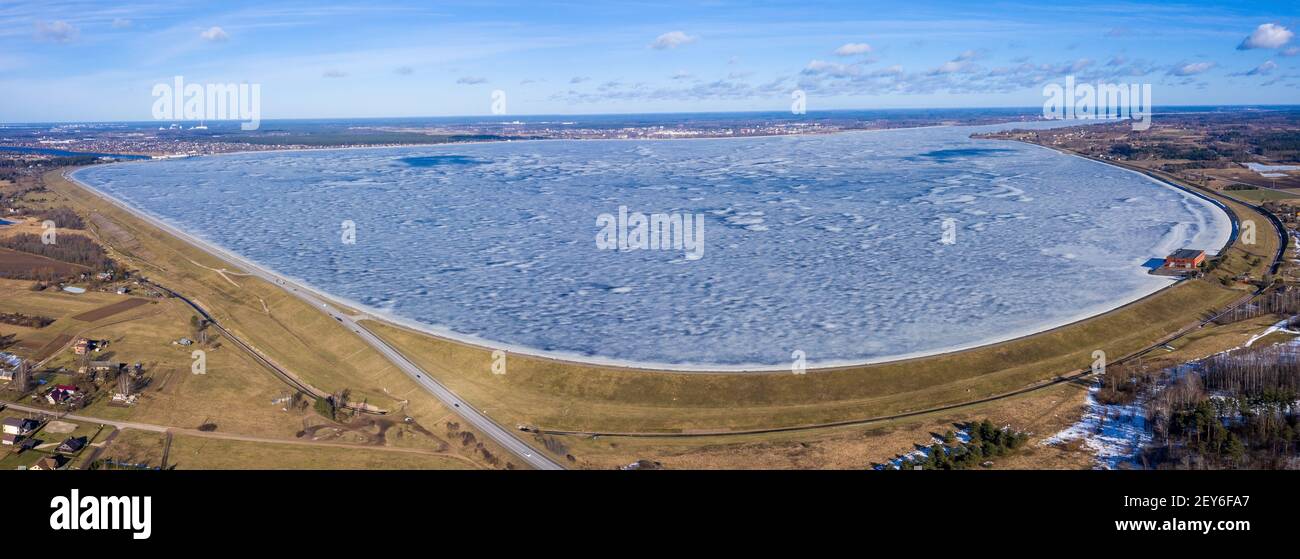 Panoramic aerial view of the winter dam near hydroelectric power plant ...