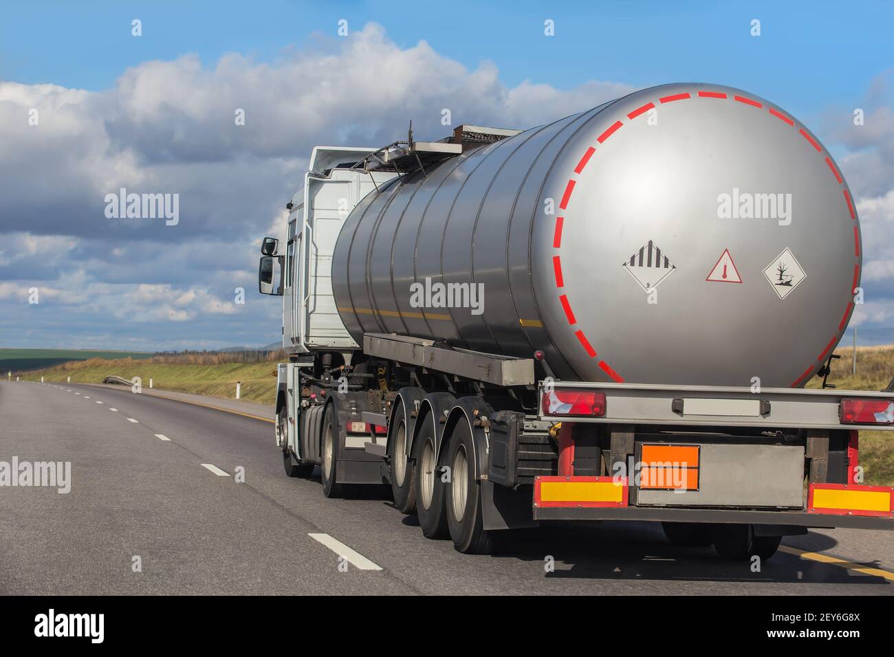 Big gas-tank truck goes on highway Stock Photo - Alamy