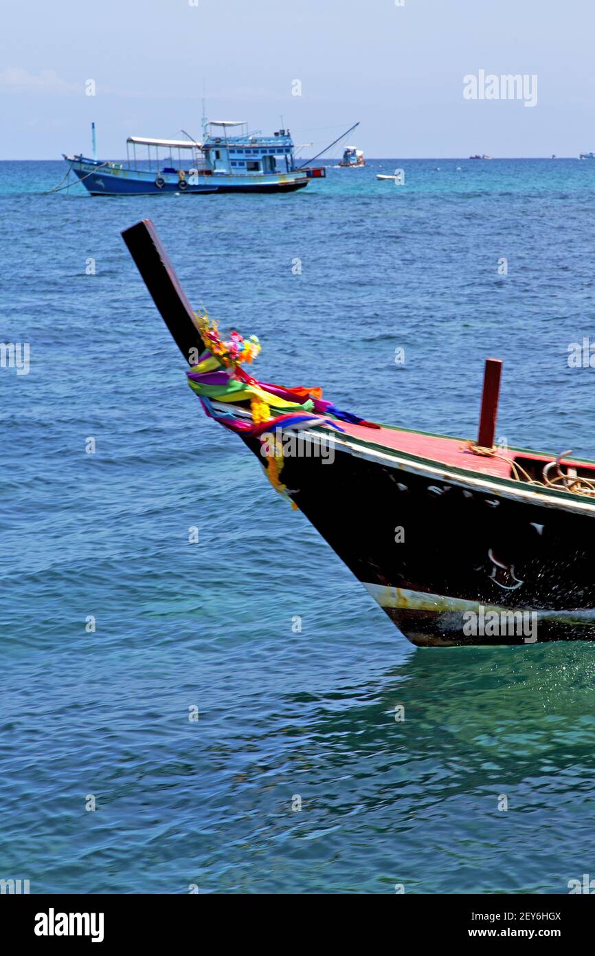 Boat prow blue lagoon stone in sea Stock Photo - Alamy