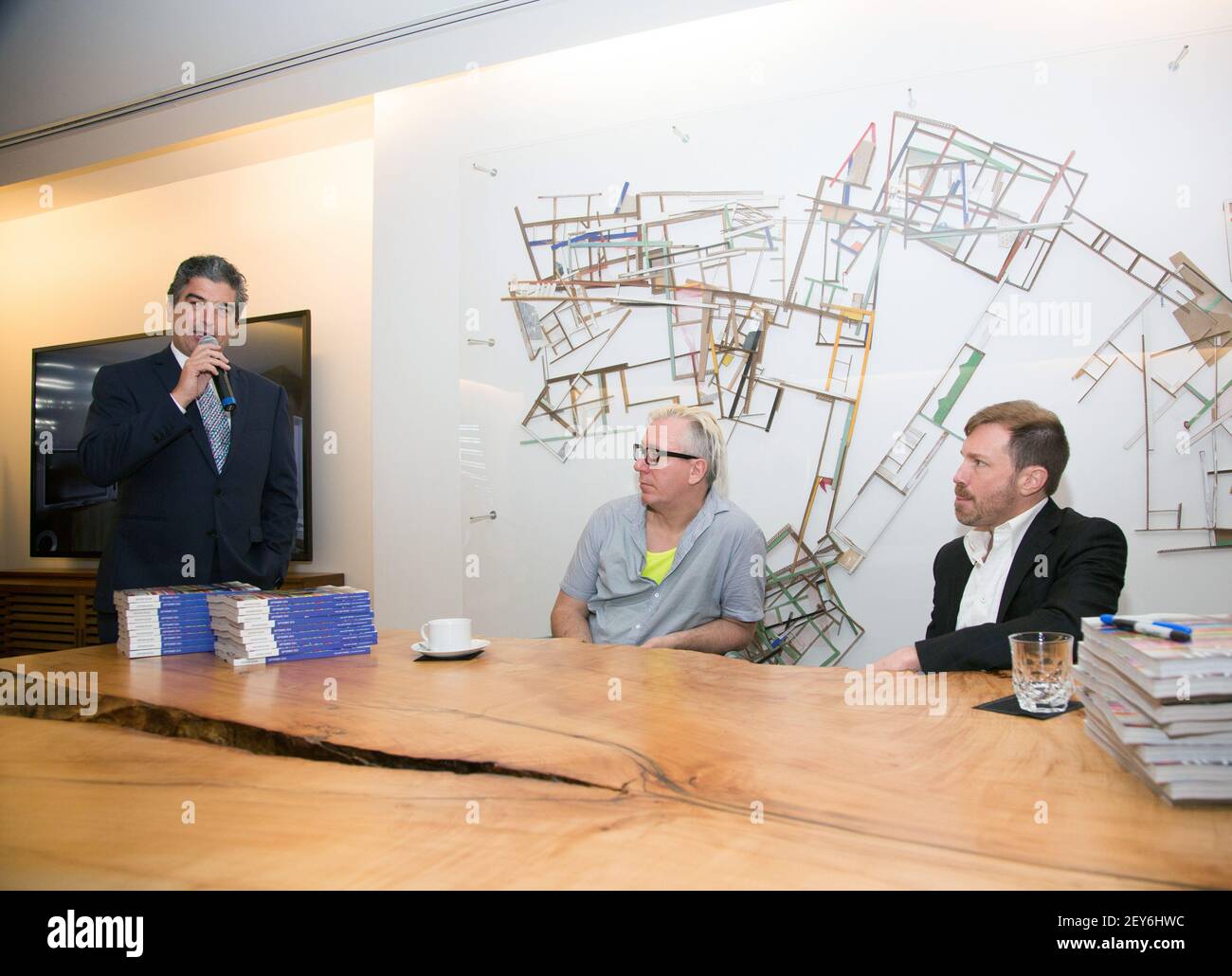 MIAMI BEACH, FLORIDA, DECEMBER 3, 2014: Carlos Rosso, artist Markus ...