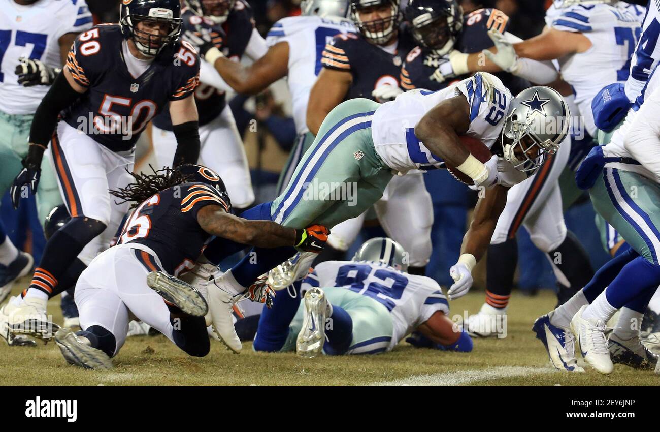 Chicago Bears wide receiver Brandon Marshall (15) leaves the field with an injury in the second ...