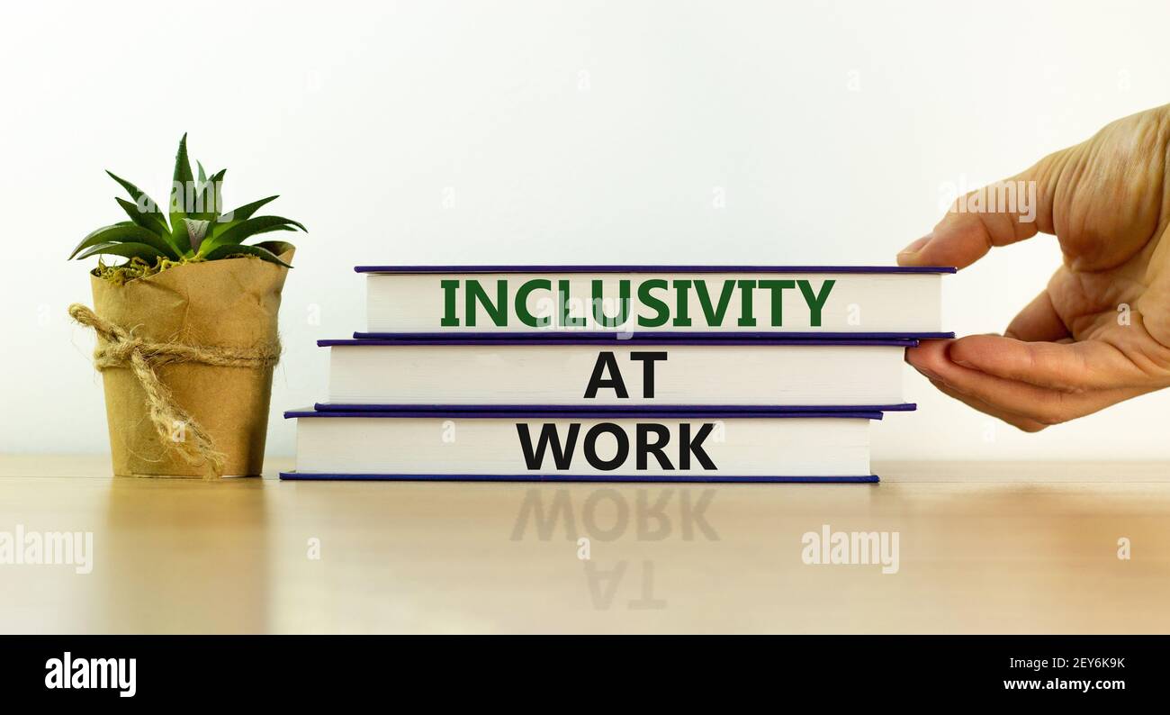 Inclusivity at work symbol. Books with words 'Inclusivity at work' on ...